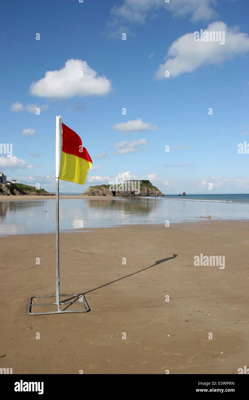 Beach safety Flag Tenby Pembrokeshire Wales UK Stock Photo - Alamy