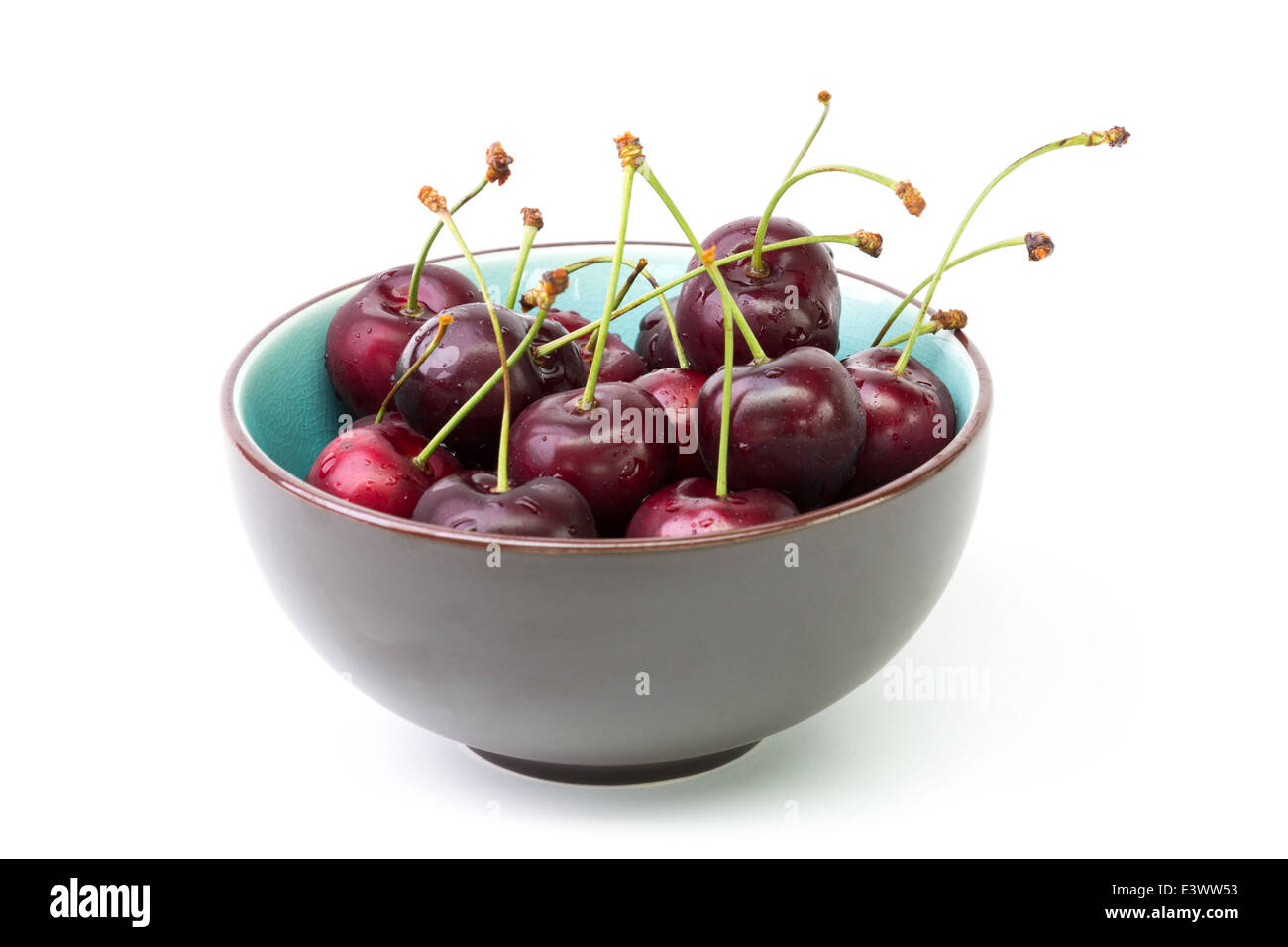 Bowl of fresh cherries on a white background, studio isolated Stock ...