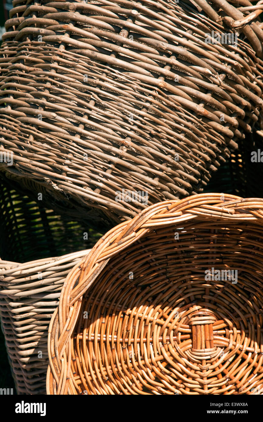 A pile of wicker baskets in the sunshine Stock Photo - Alamy