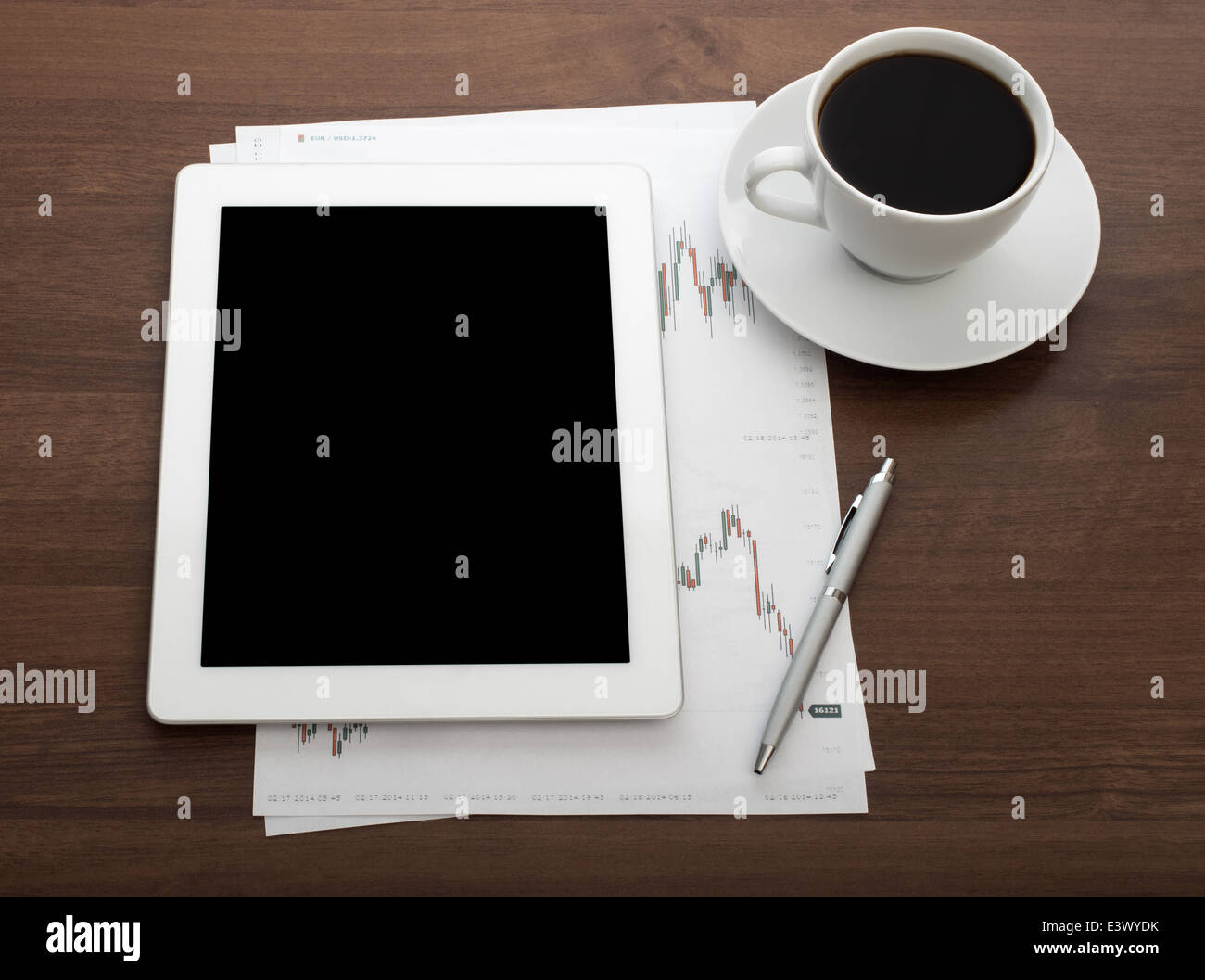 Digital tablet on wooden tablets with mobile and coffee Stock Photo - Alamy