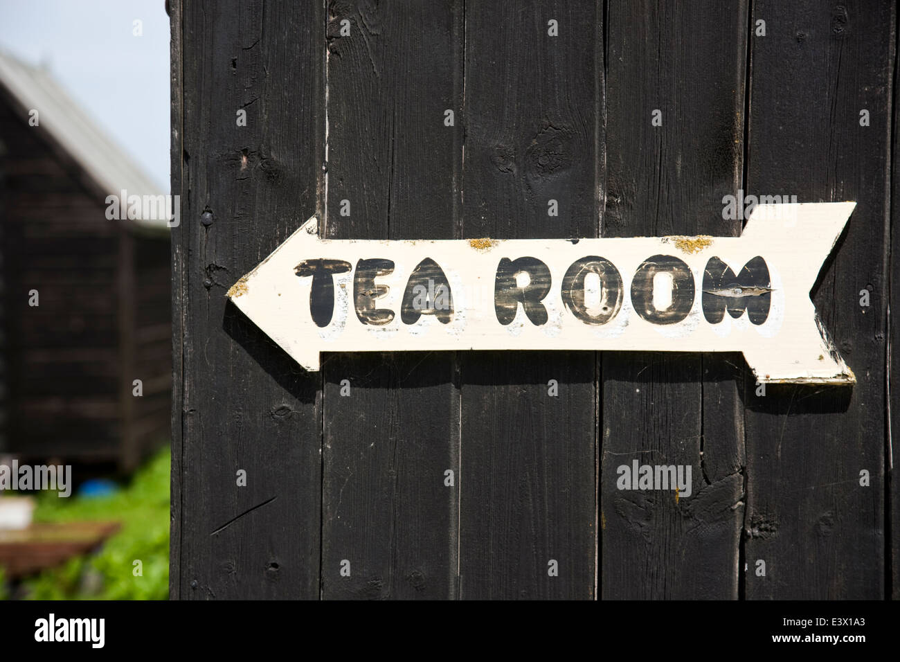 Hand painted sign for Tea Room in shape of an arrow Stock Photo - Alamy