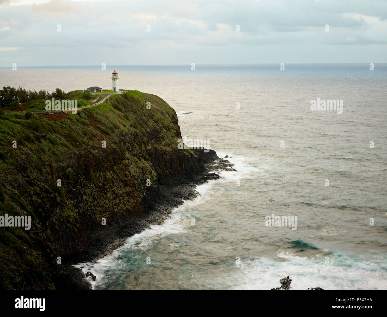 Lighthouse on point in Hawaii Stock Photo - Alamy