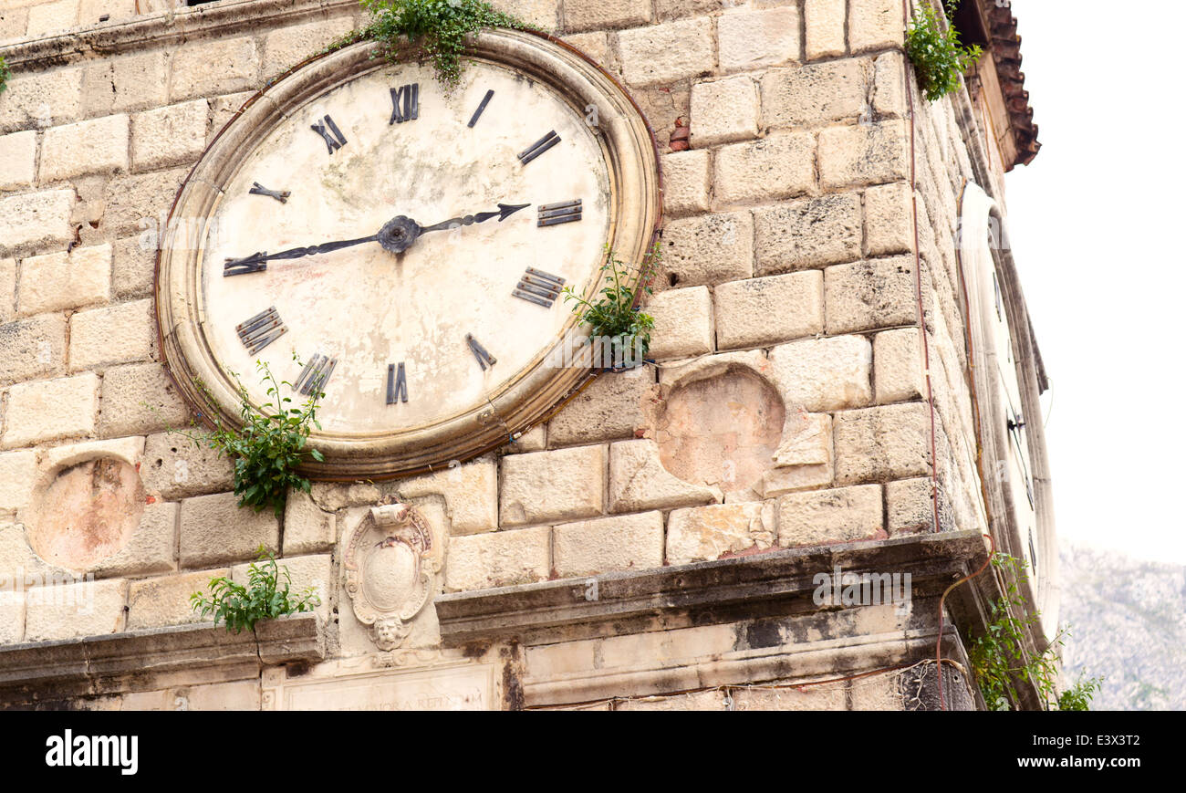 Antique stone clock on wall hi-res stock photography and images - Alamy