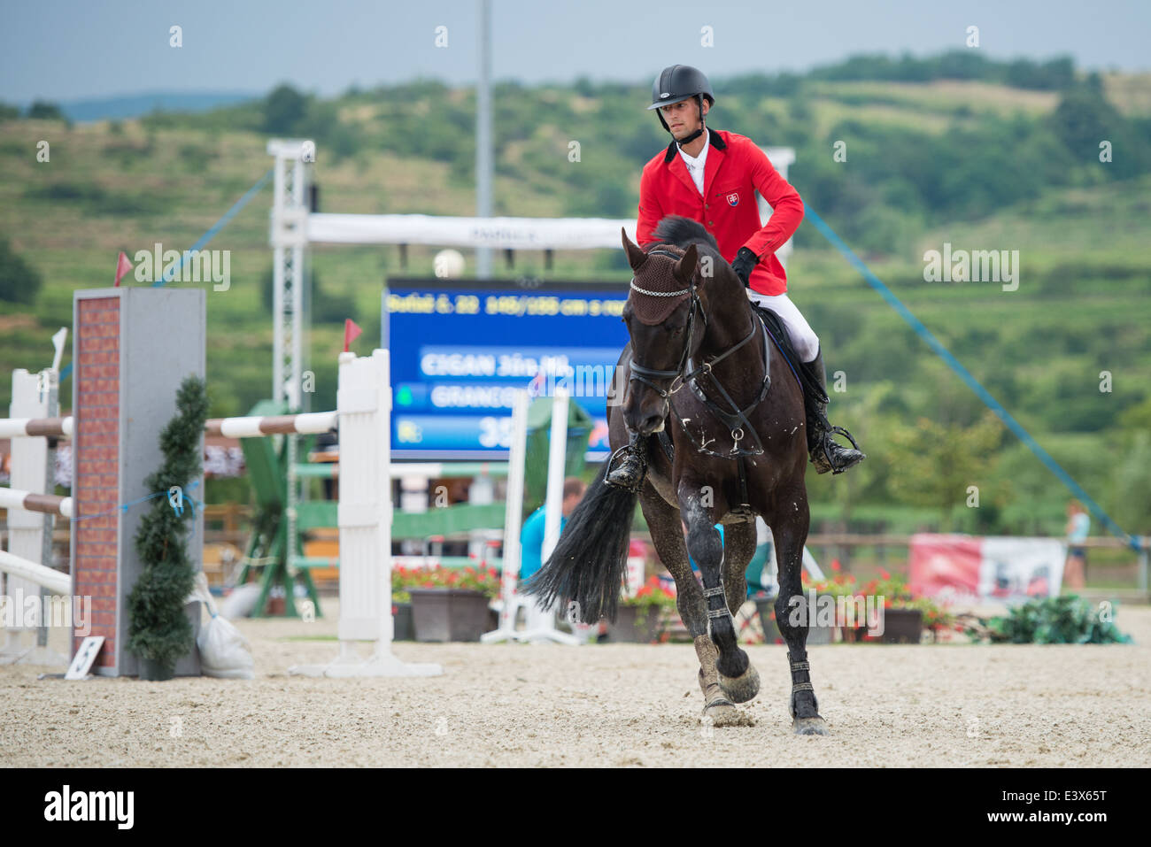 Jan Cigan jr. (SVK) on horse Grancor in action on Rozalka Cup 2014 on ...