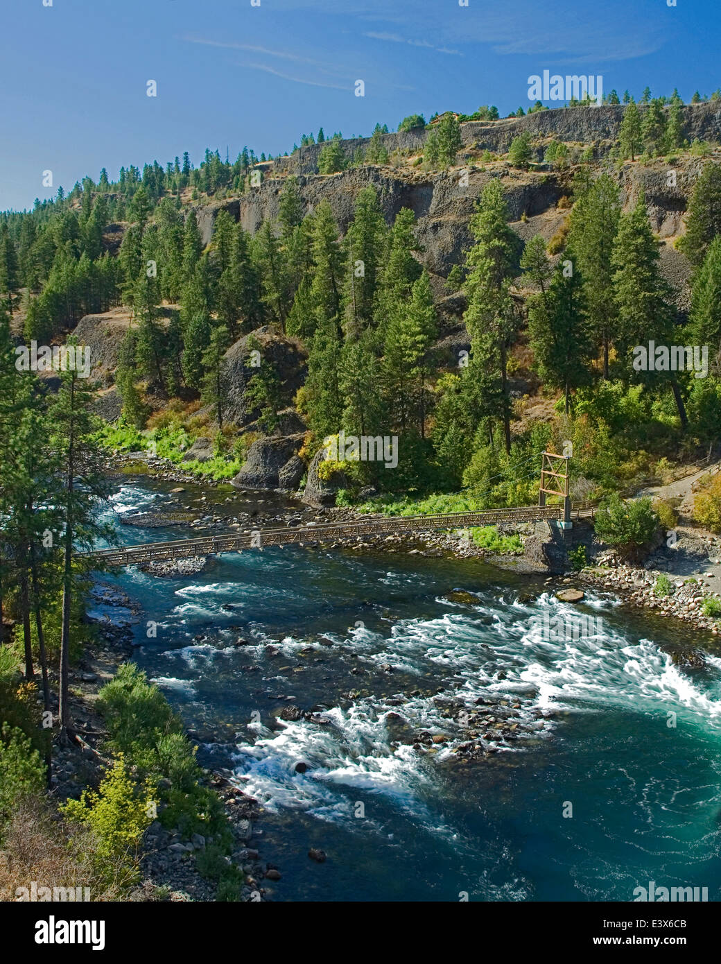 USA, Washington. Spokane, Spokane River, Riverside State Park, Swinging ...