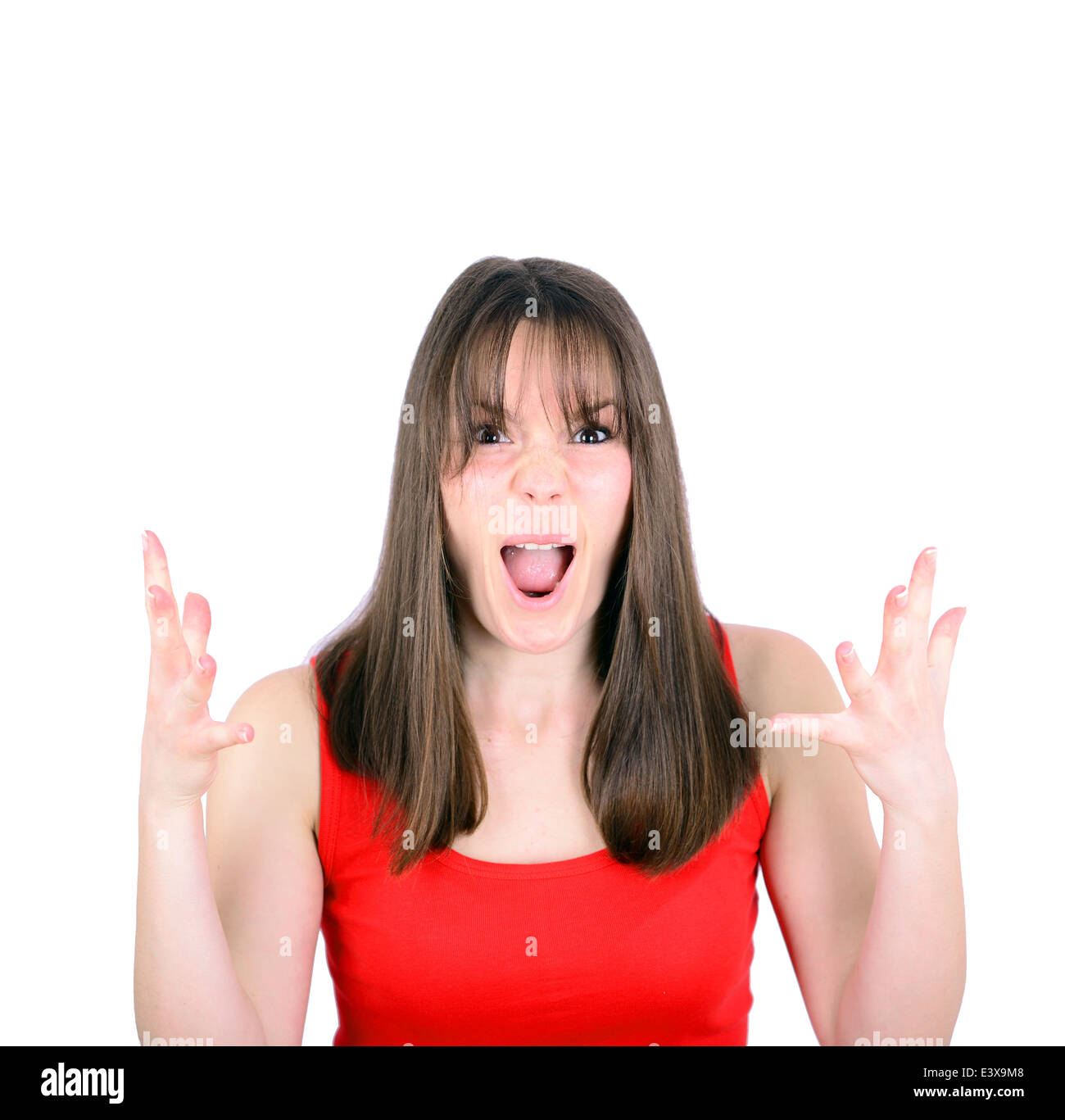 Young woman screaming with funny face isolated on white background ...