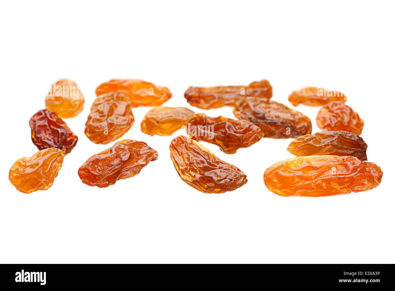 Yellow raisin closeup isolated on white Stock Photo - Alamy