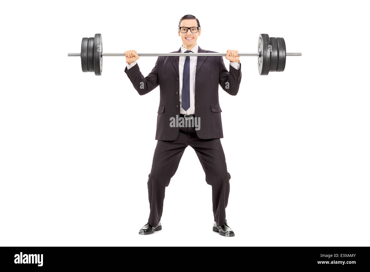 Full length portrait of a businessman holding a heavy weight Stock ...