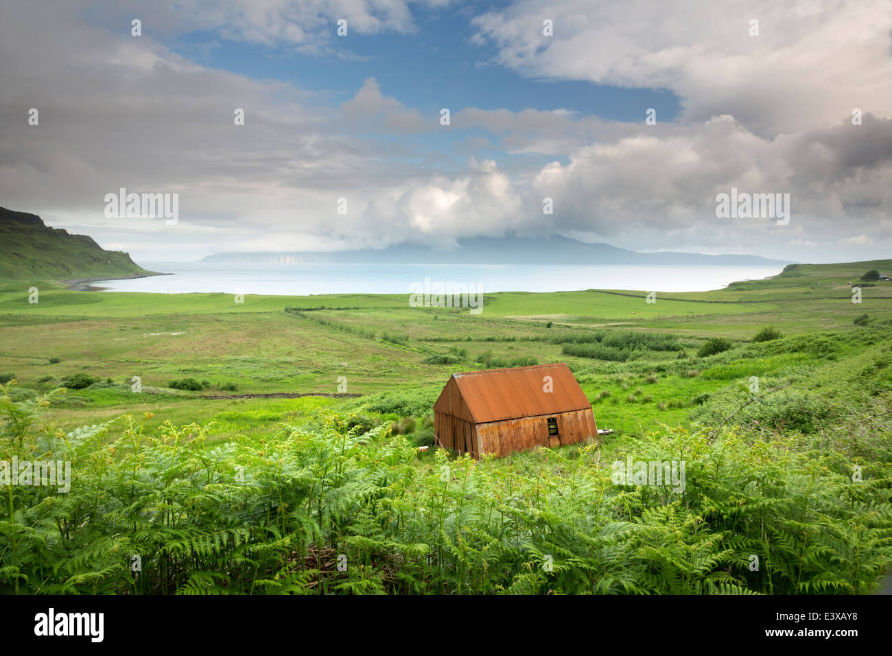 Laig bay Cleadale on the Isle of Eigg with the distant isle of Rhum on ...