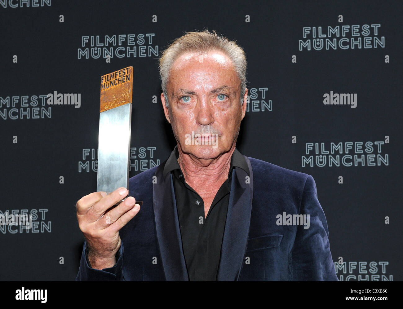 Munich, Germany. 30th June, 2014. German actor Udo Kiefer is awarded ...