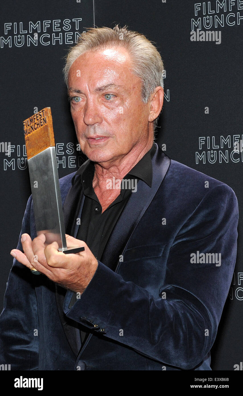Munich, Germany. 30th June, 2014. German actor Udo Kiefer is awarded ...
