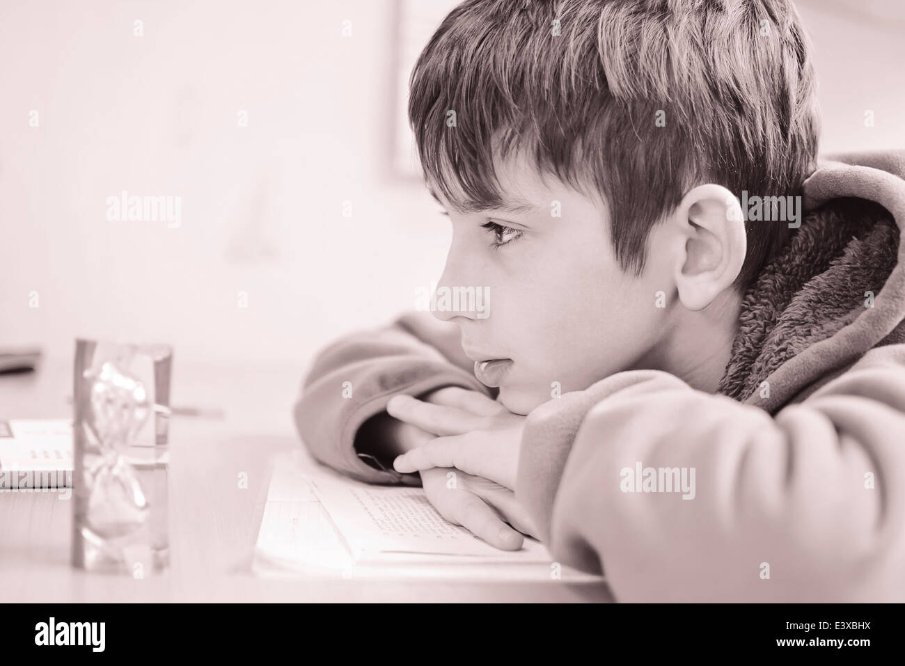 Boy doing his homework Stock Photo - Alamy