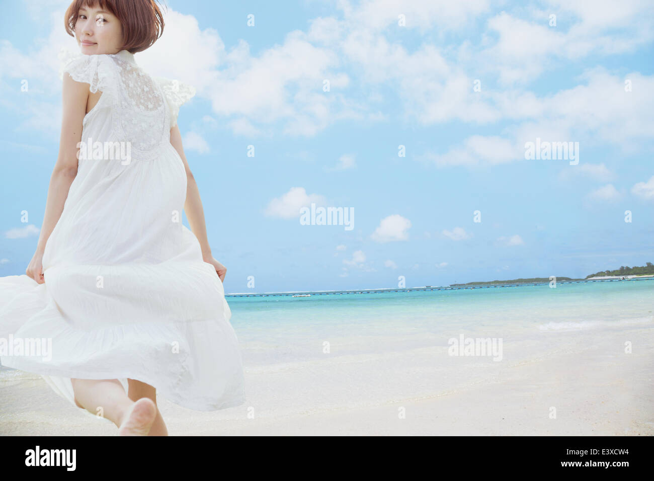 Woman at the beach Stock Photo - Alamy