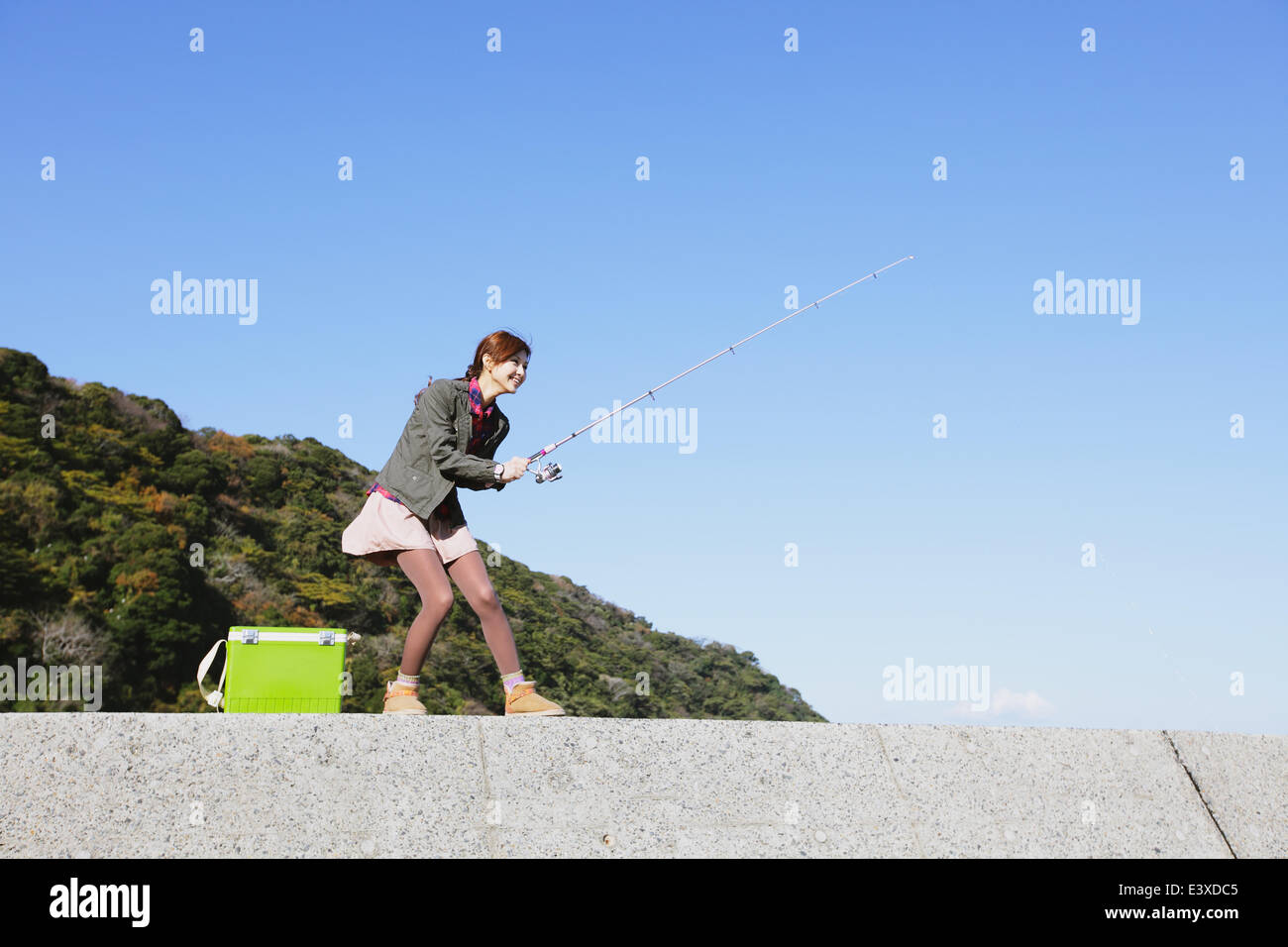 Japanese woman fishing hi-res stock photography and images - Alamy