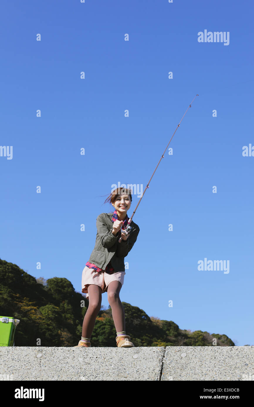 Japanese woman fishing hi-res stock photography and images - Alamy