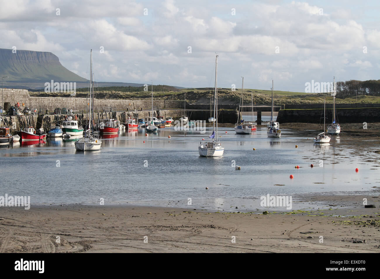 Evening sunshine at Mullaghmore harbour in County Sligo Ireland with ...