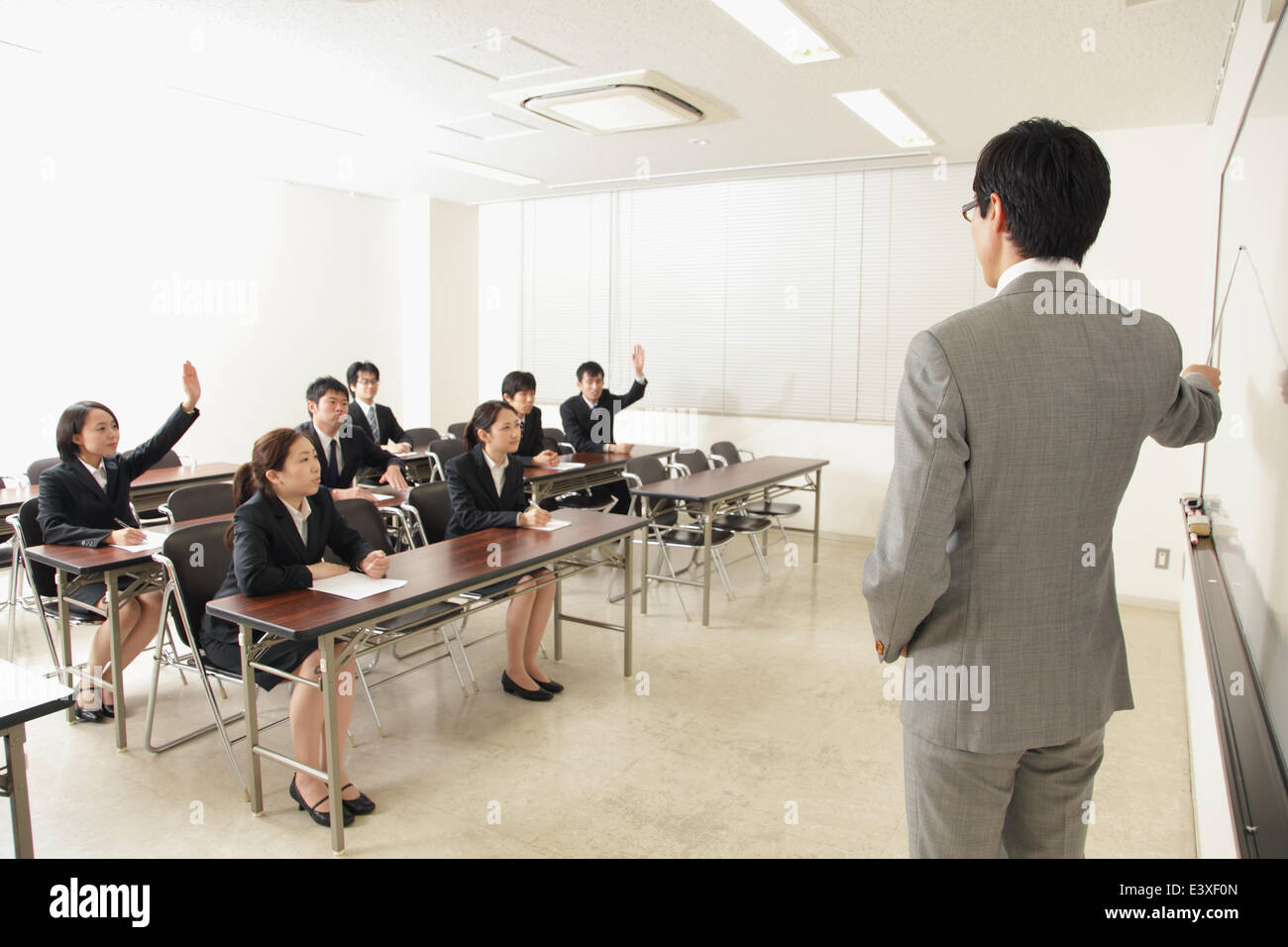 Japanese business people training Stock Photo - Alamy