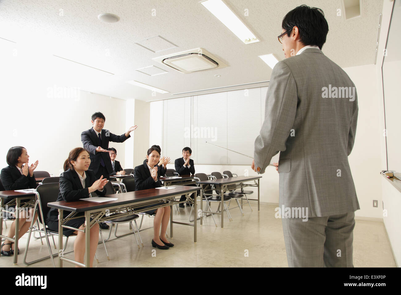 Japanese business people training Stock Photo - Alamy