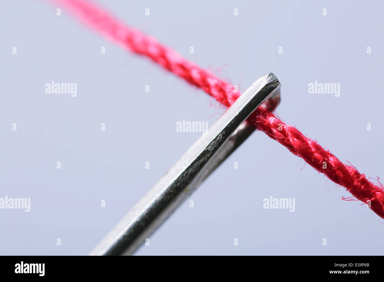 Needle And Thread Stock Photo - Alamy