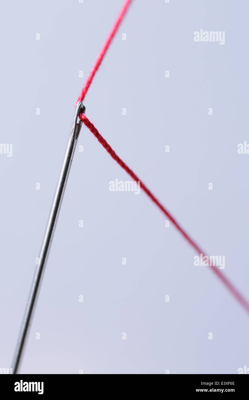 Needle And Thread Stock Photo - Alamy