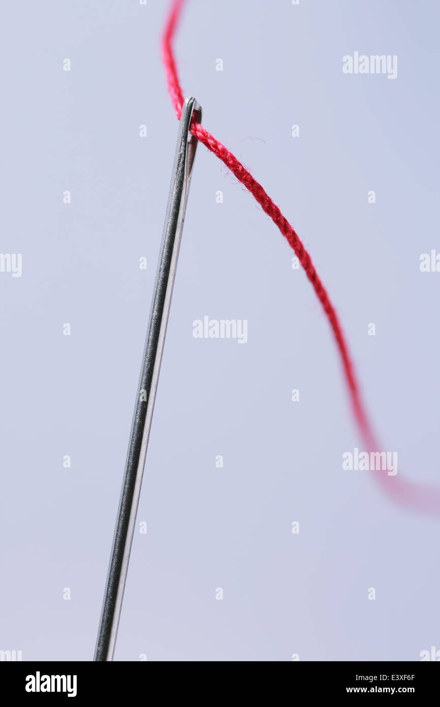 Needle And Thread Stock Photo - Alamy