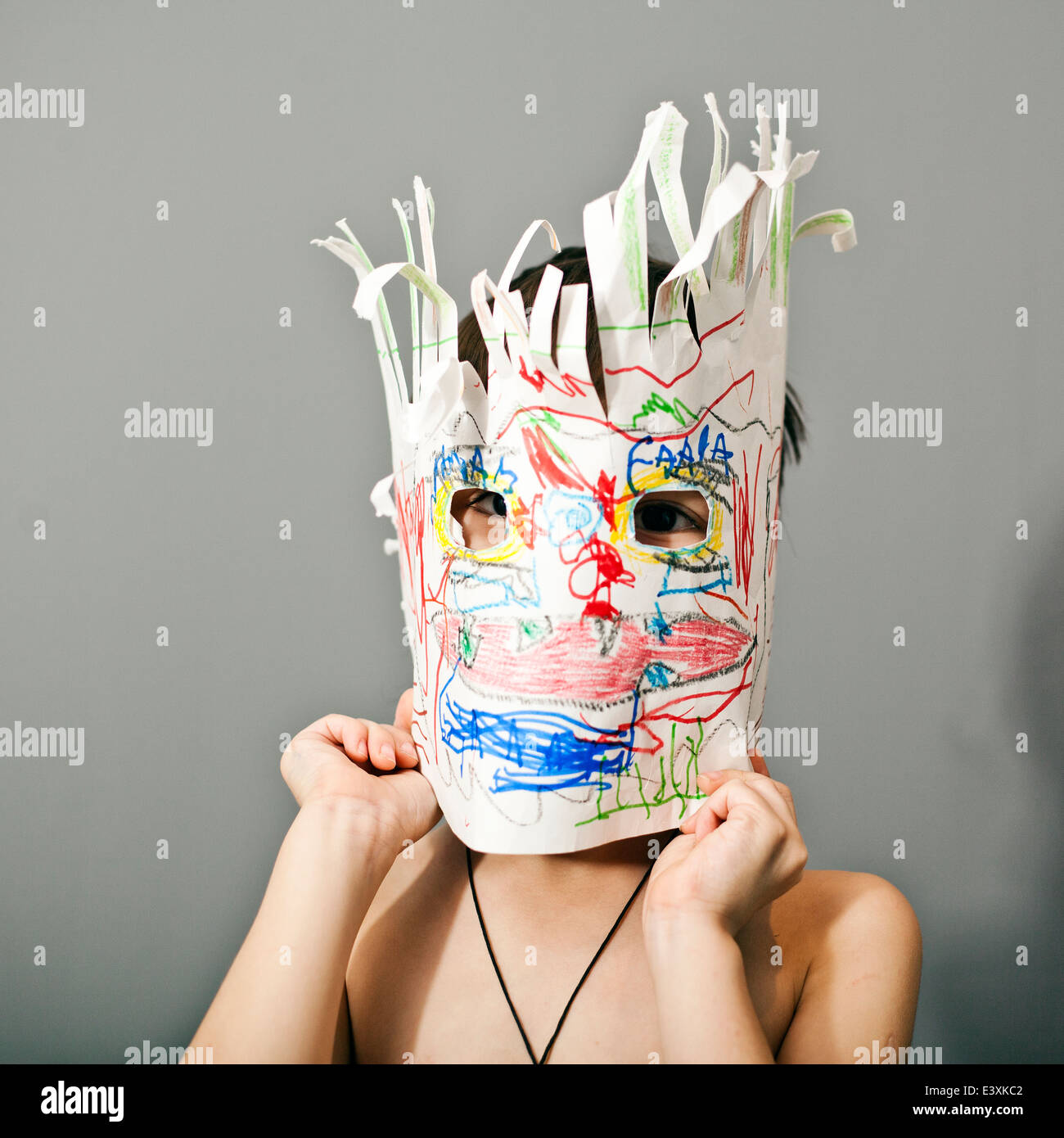 Boys wearing colorful mask Stock Photo - Alamy