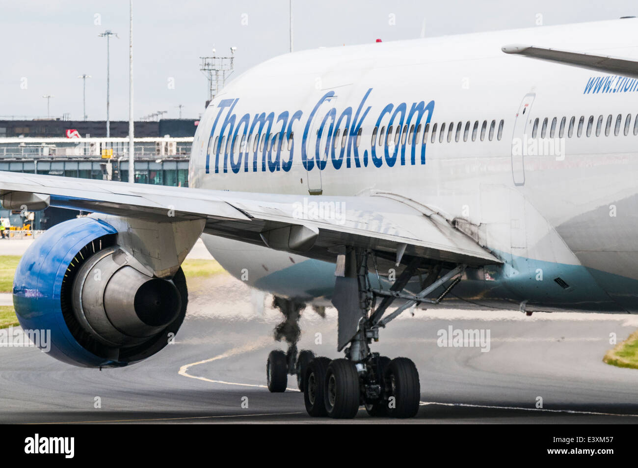 Close up of the wing engine and landing gear of a Thomas Cook Boeing ...