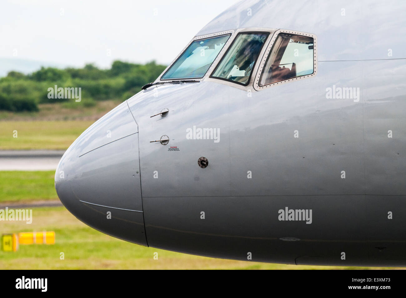 Closeup up view of a Jet 2.com Boeing 757-200 aircrafts cockpit as it ...