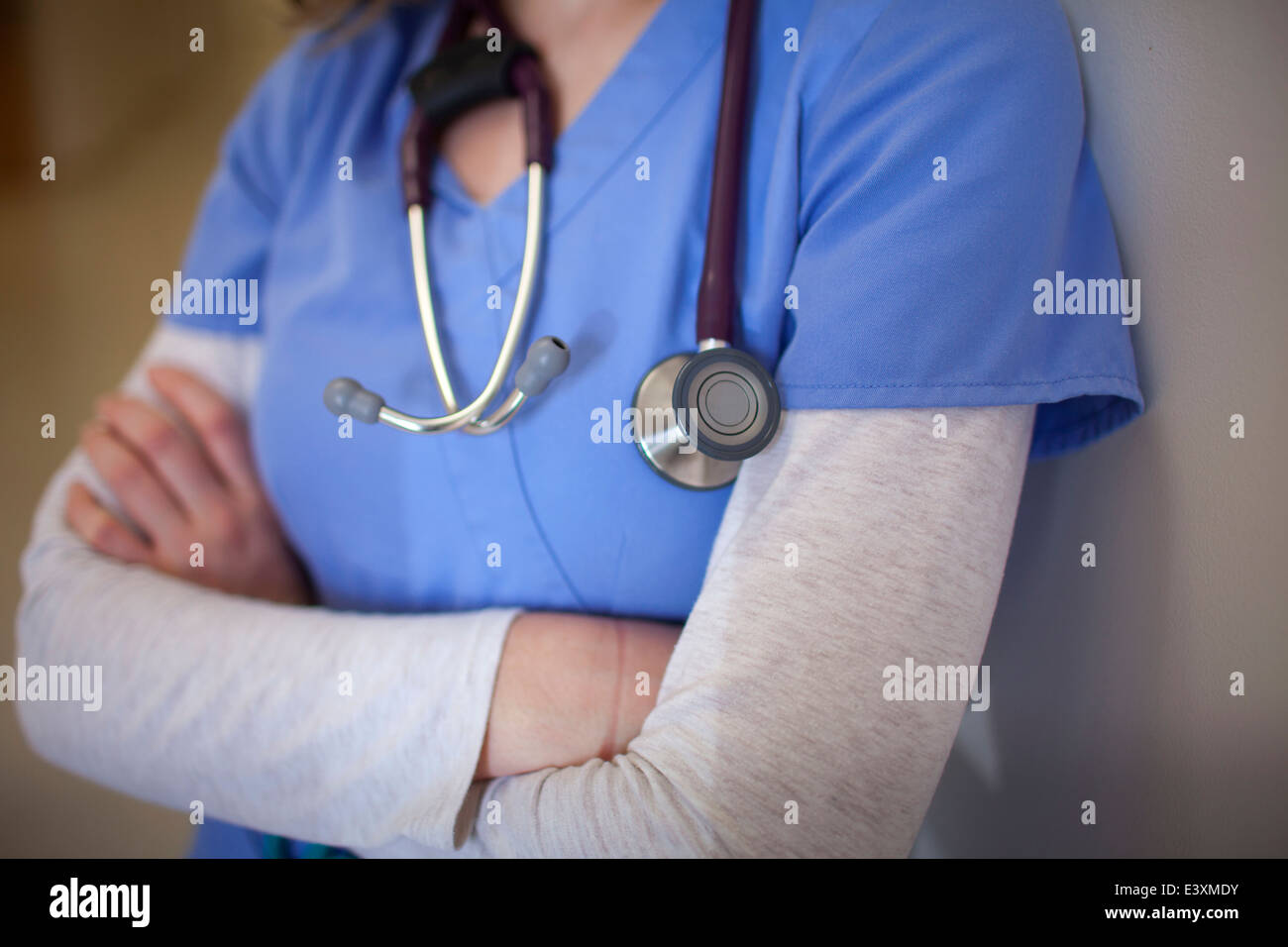 Caucasian nurse wearing stethoscope in hospital Stock Photo - Alamy