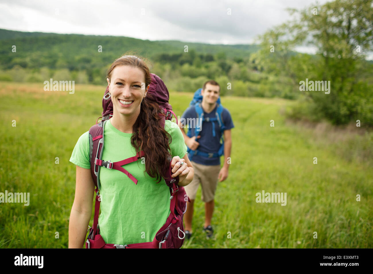 Two happy young women rural landscape looking view hi-res stock ...