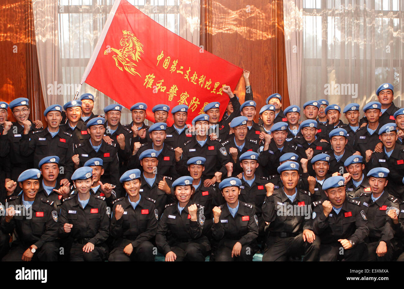 Beijing, China. 1st July, 2014. Chinese riot police pose for a group ...