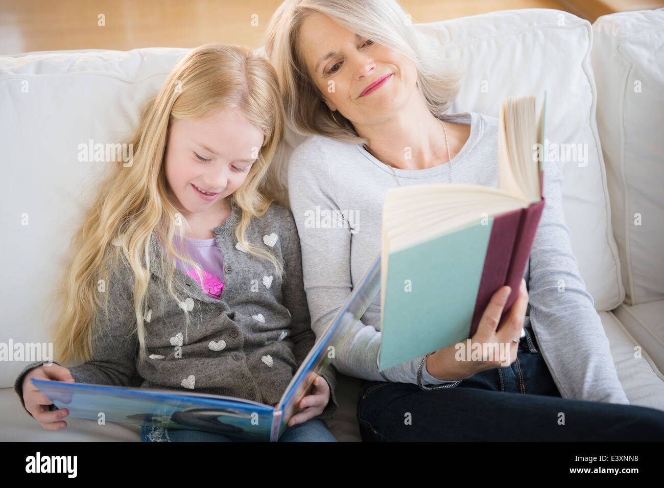 Girl reading together hi-res stock photography and images - Alamy