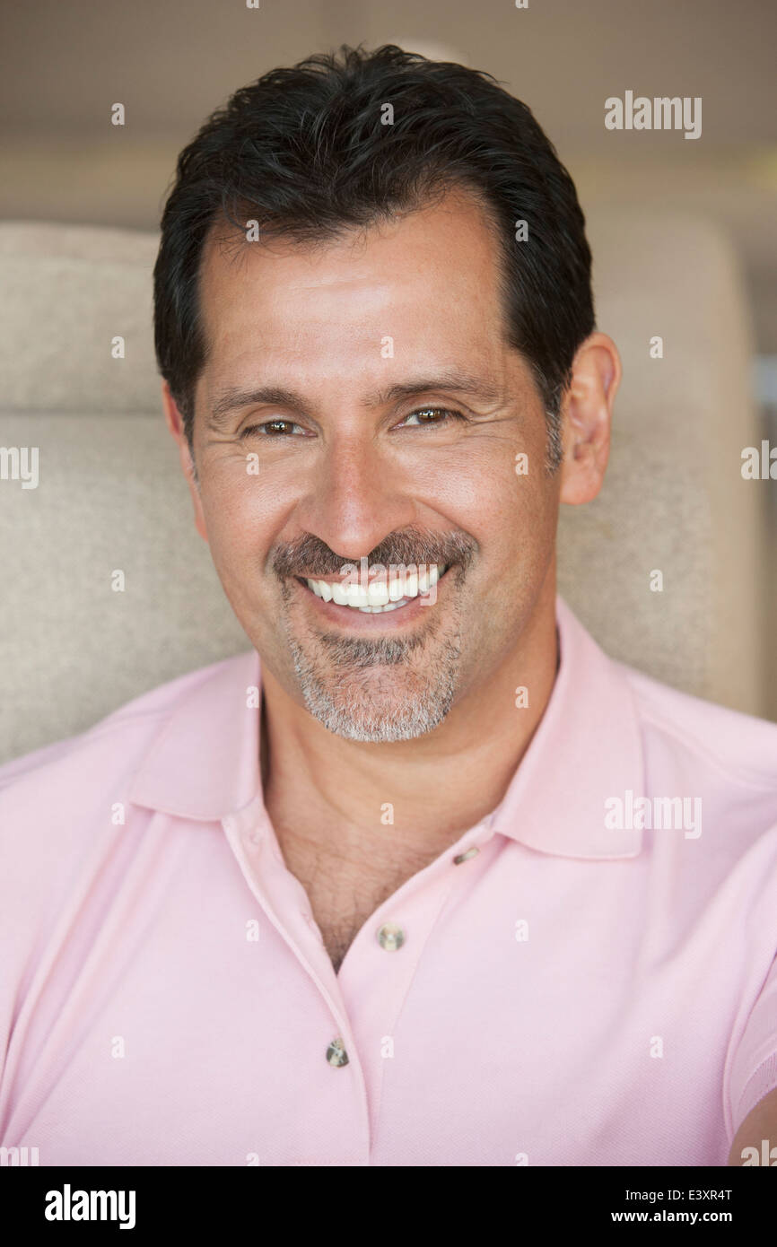 Hispanic man smiling Stock Photo - Alamy