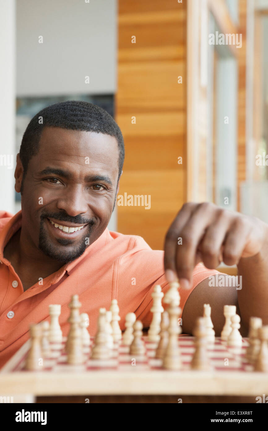 Black american man playing chess hi-res stock photography and images ...
