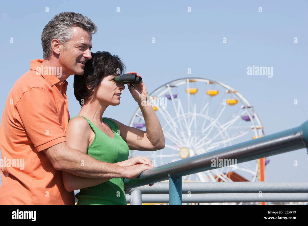 Mature couple using binoculars hi-res stock photography and images - Alamy