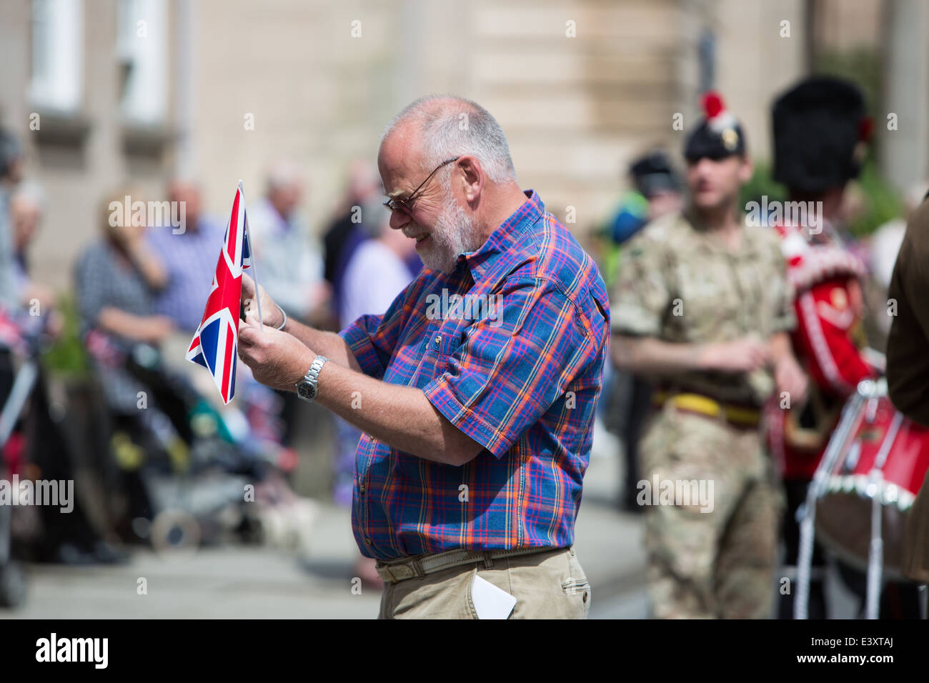 man with beard photographing victory parade Stock Photo - Alamy