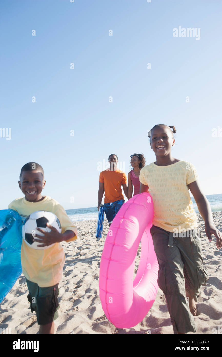 Looking away walking carrying childhood holding hi-res stock ...