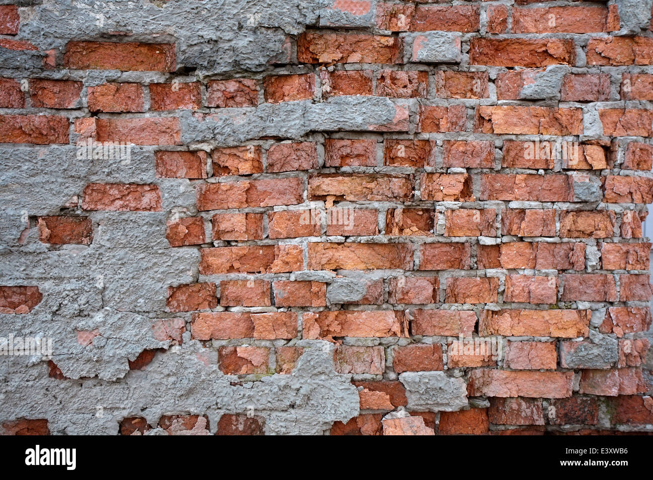 red brick damaged wall closeup pattern background Stock Photo - Alamy