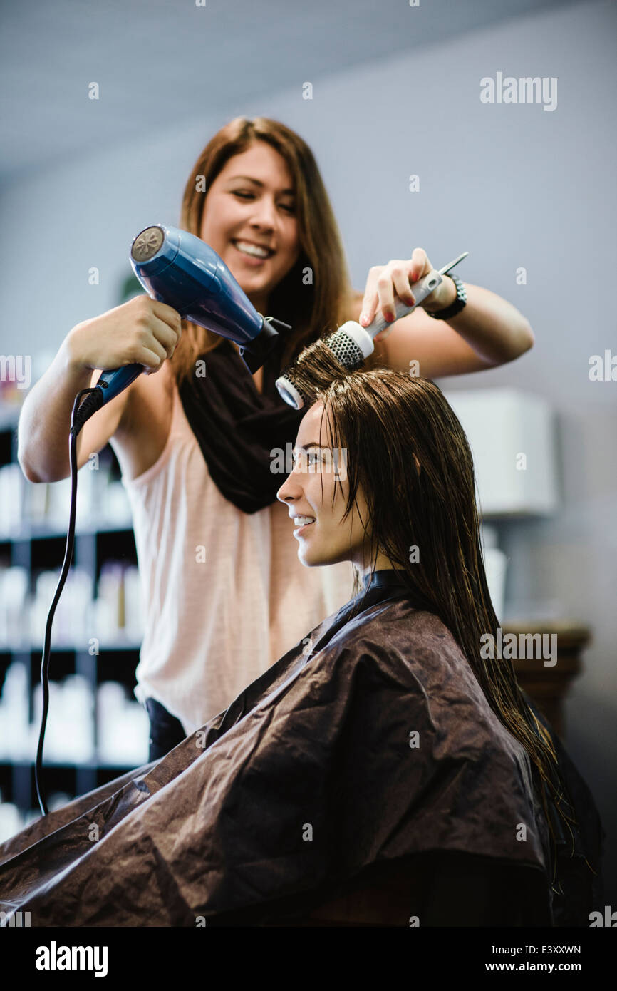 Hair stylist working on client hi-res stock photography and images - Alamy