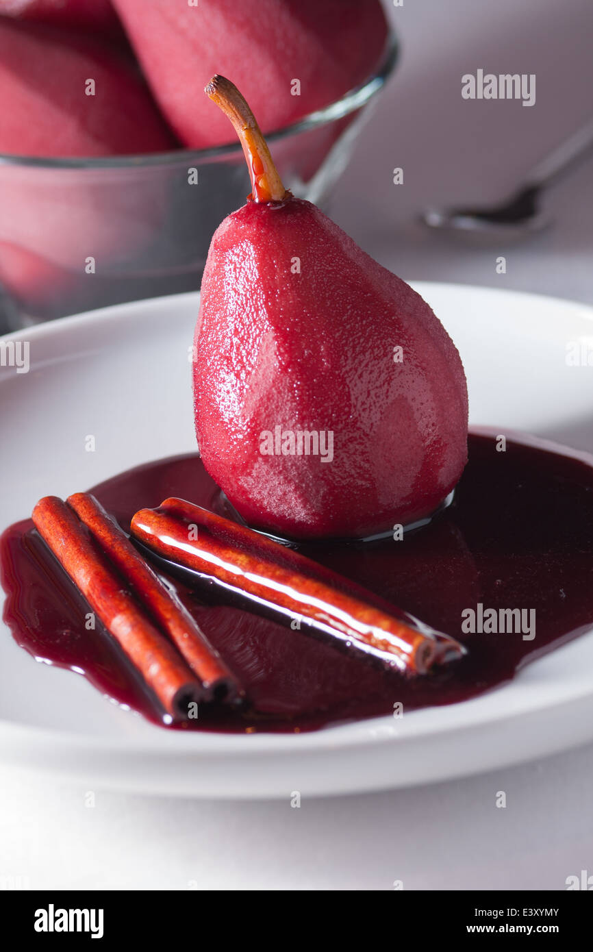 Poached pear in red hi-res stock photography and images - Alamy
