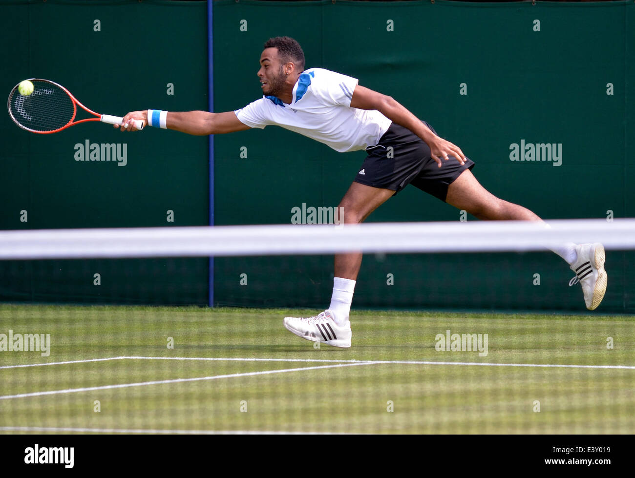 Manchester, UK. 1st July, 2014. Joshua Ward-Hibbert stretches to return ...