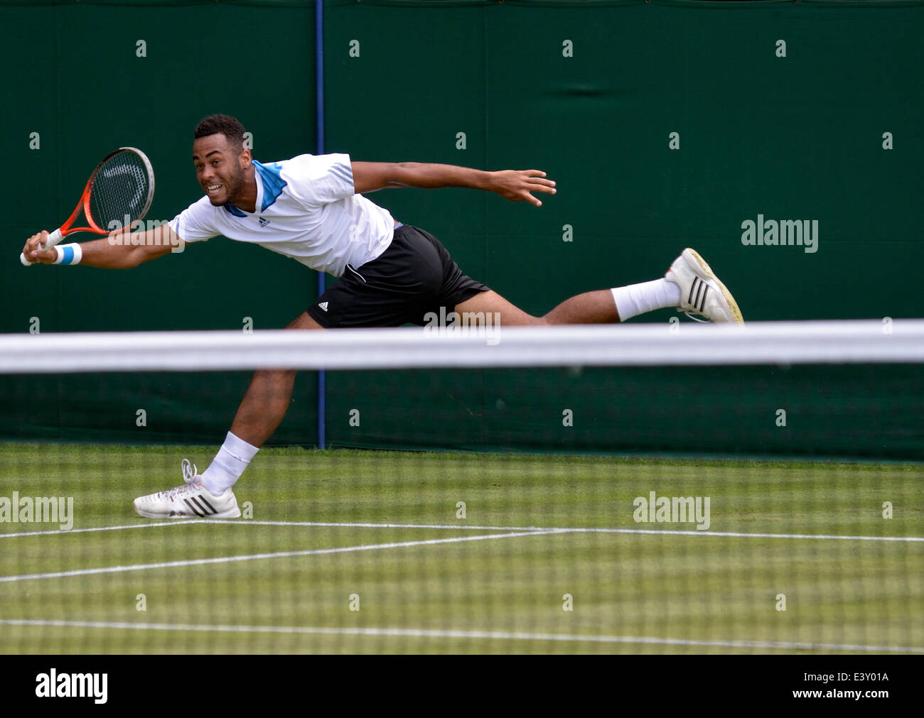 Manchester, UK. 1st July, 2014. Joshua Ward-Hibbert stretches to return ...