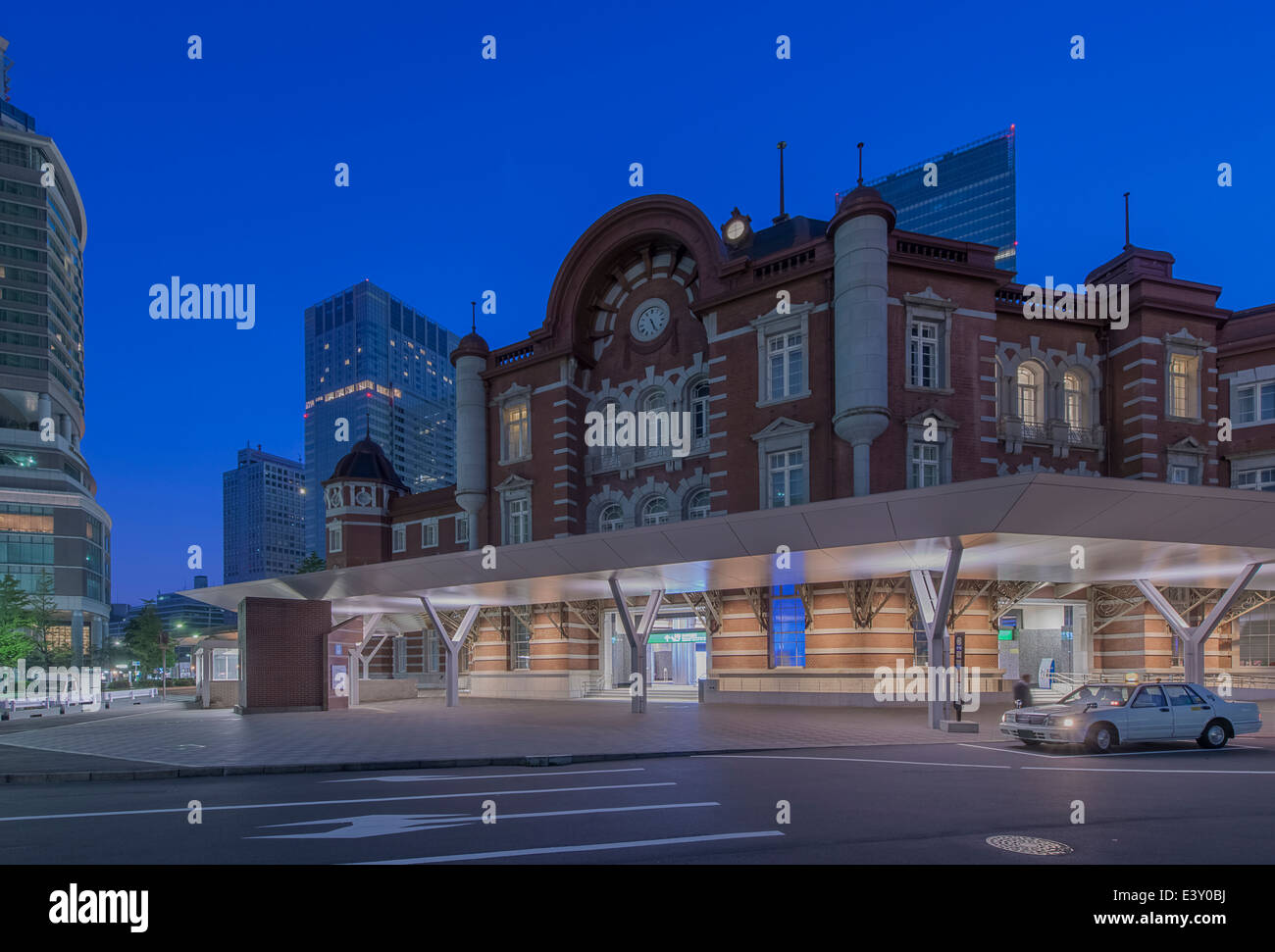 Urban buildings lit up at night Stock Photo - Alamy