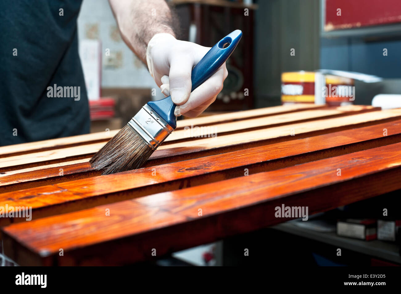 Varnishing wooden boards Stock Photo - Alamy