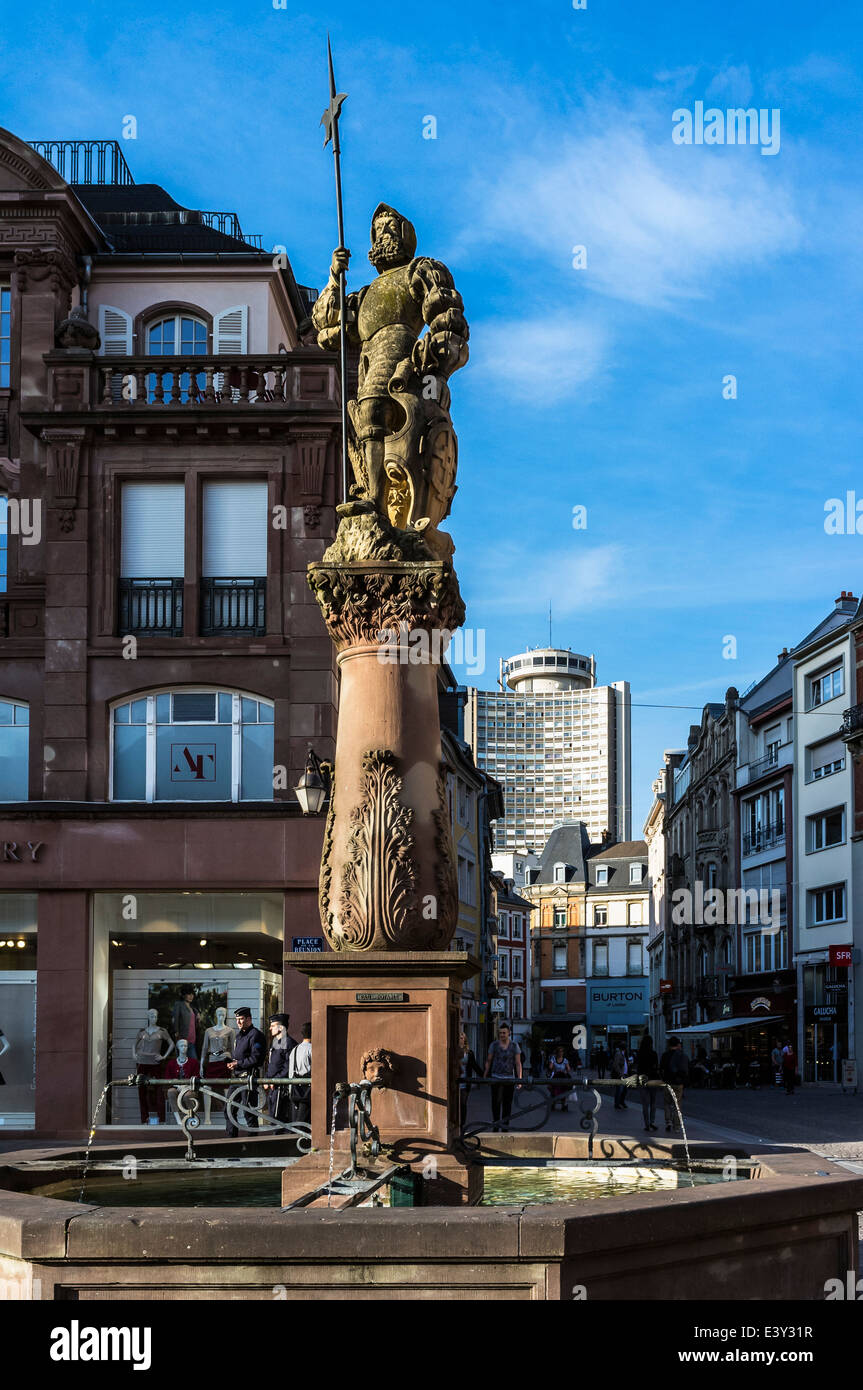 Stockbrunnen fountain with halberdier statue and Tour de l'Europe tower ...