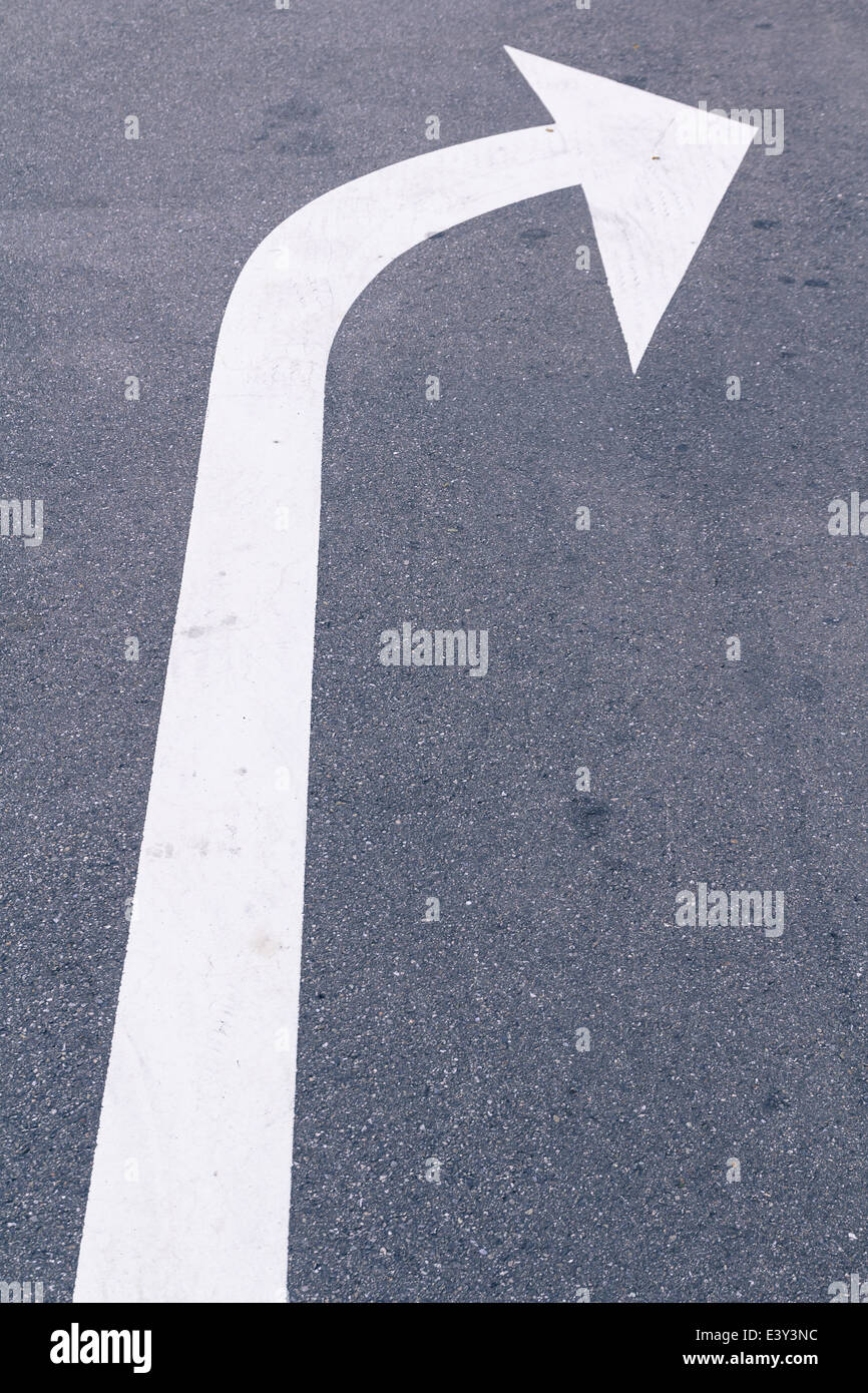 Turn right arrow traffic symbol on street Stock Photo - Alamy