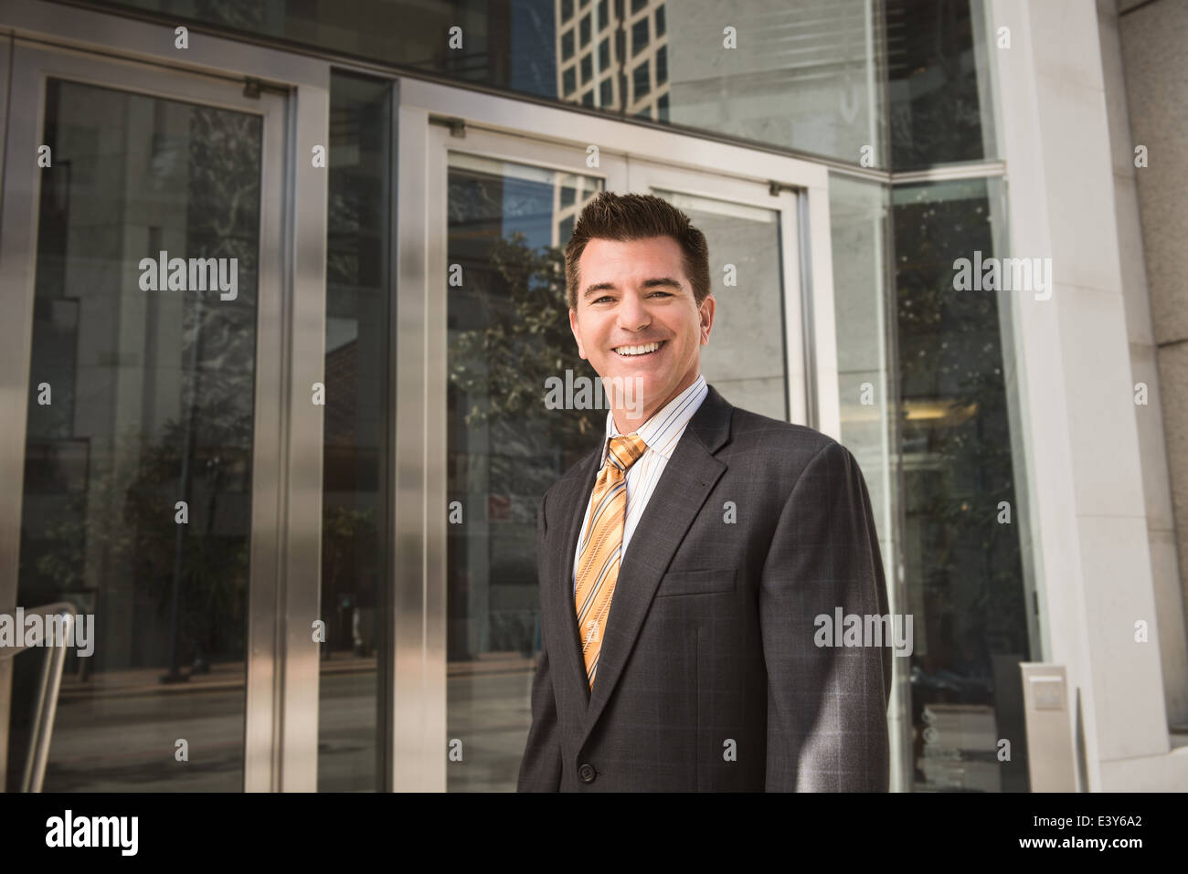Older businessman outside standing hi-res stock photography and images ...