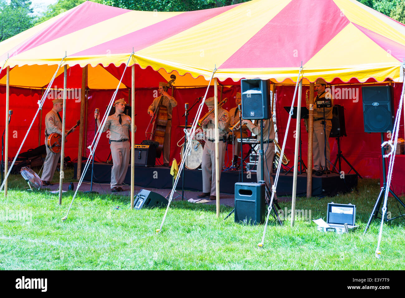 East Devon, England. A Fete and garden party with a group playing ...
