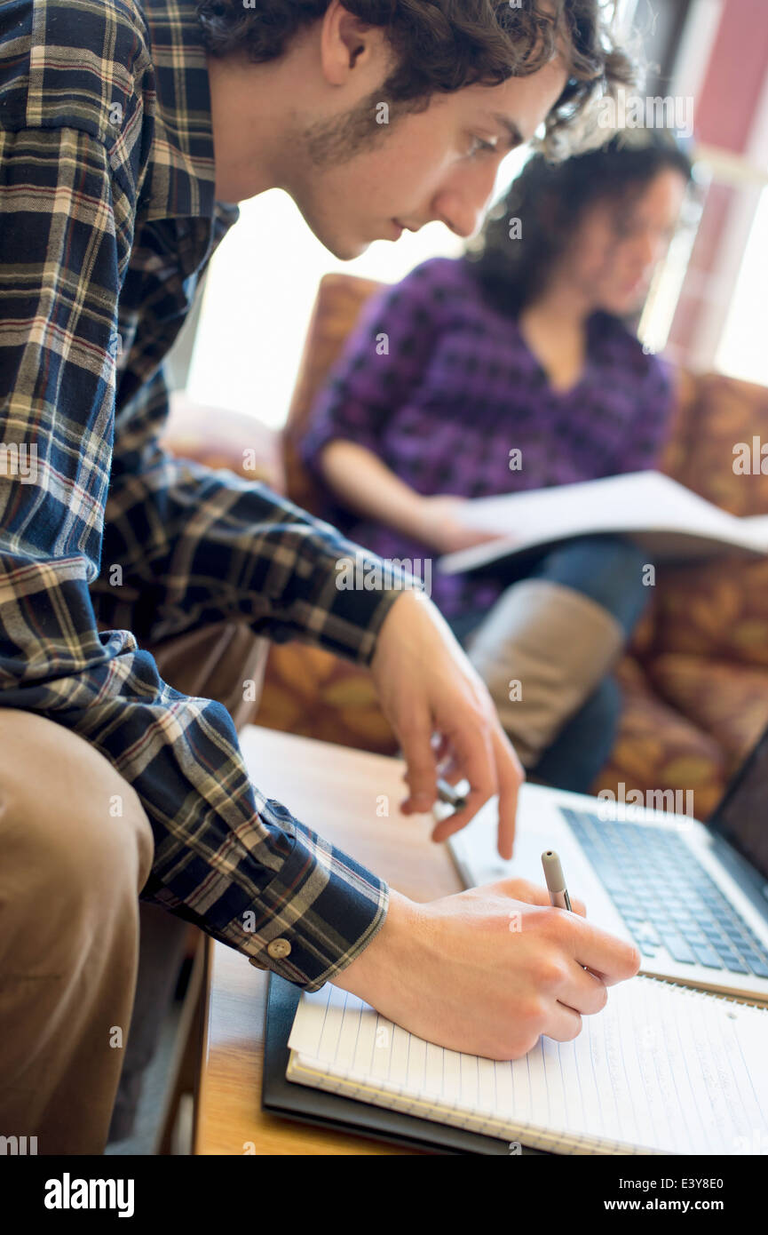 Student making notes Stock Photo - Alamy