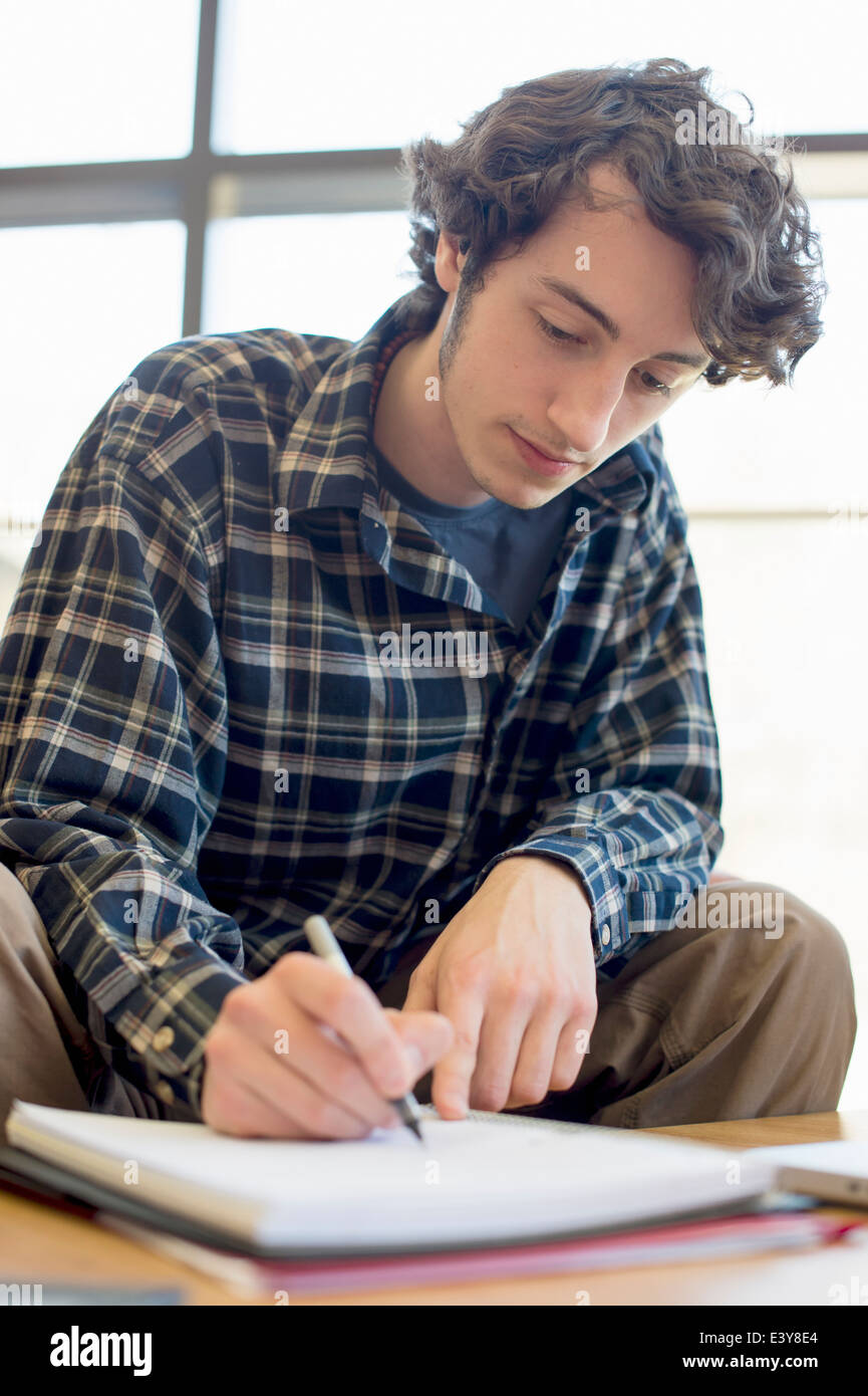 Student making notes Stock Photo - Alamy